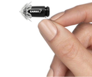 Hand holding Eargo 7 device.